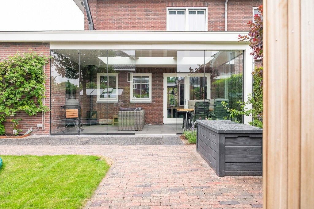 Witte veranda aan huis | Reus Buitenkamers